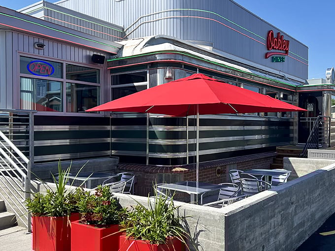 The gleaming chrome exterior of Oakley Diner beckons with its outdoor patio—perfect for savoring that legendary Reuben sandwich amid Utah's mountain scenery.