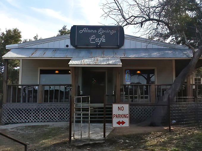 The unassuming exterior of Alamo Springs Café stands as a beacon for burger pilgrims. That metal roof has weathered countless Texas summers while sheltering burger perfection beneath.