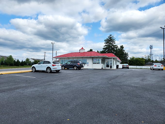 The iconic red-striped roof of Speck's stands out against Pennsylvania skies like a beacon calling hungry travelers home to fried chicken paradise.