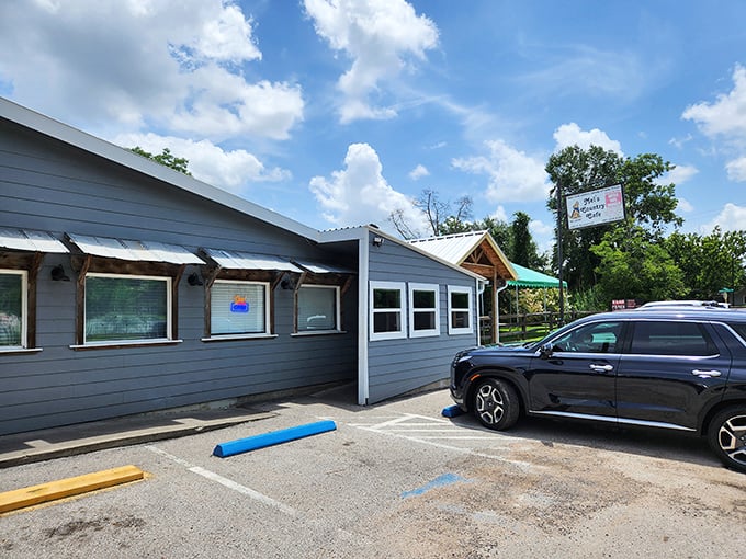 Another angle reveals Mel's modest facade - proof that in Texas, the most spectacular food often hides in the most ordinary buildings.