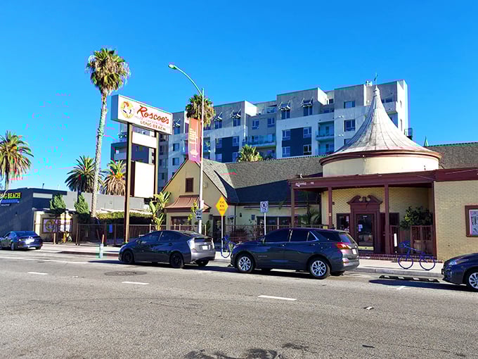 Roscoe’s sign rises above Long Beach, a legendary landmark where chicken and waffles rule the California comfort food scene.