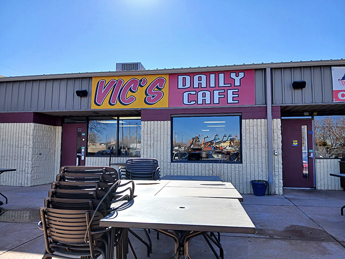 The purple and red signage of Vic's Daily Cafe stands out like a beacon for hungry travelers. No fancy frills, just the promise of honest-to-goodness comfort food.