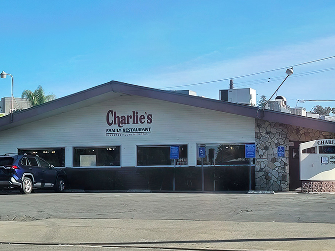 Charlie's iconic sign stands tall against Escondido's blue skies, a beacon for hungry souls seeking comfort food salvation.