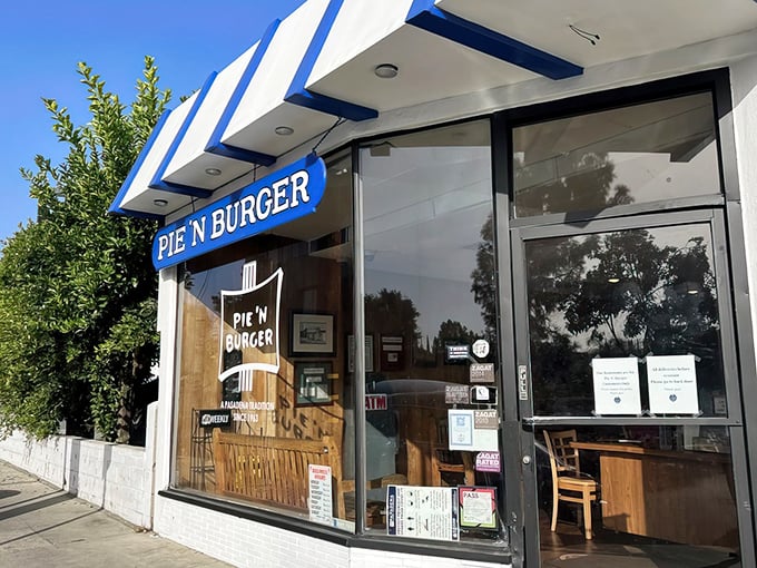That classic storefront isn't trying to impress anyone with trendy design—it's too busy focusing on what matters: the perfect burger waiting inside.