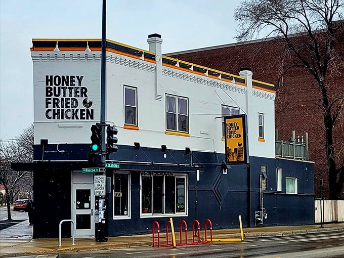 The corner building announces its mission with bold confidence: fried chicken that's worth crossing town for, no fancy explanations needed.