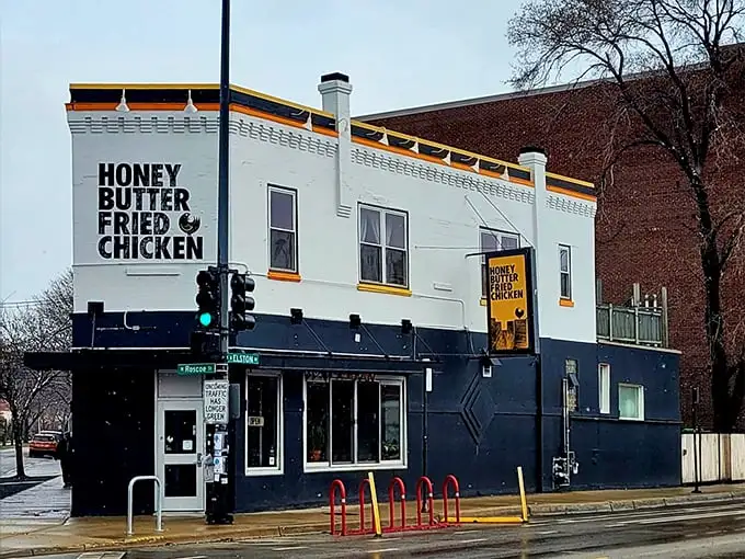 The corner building announces its mission with bold confidence: fried chicken that's worth crossing town for, no fancy explanations needed.