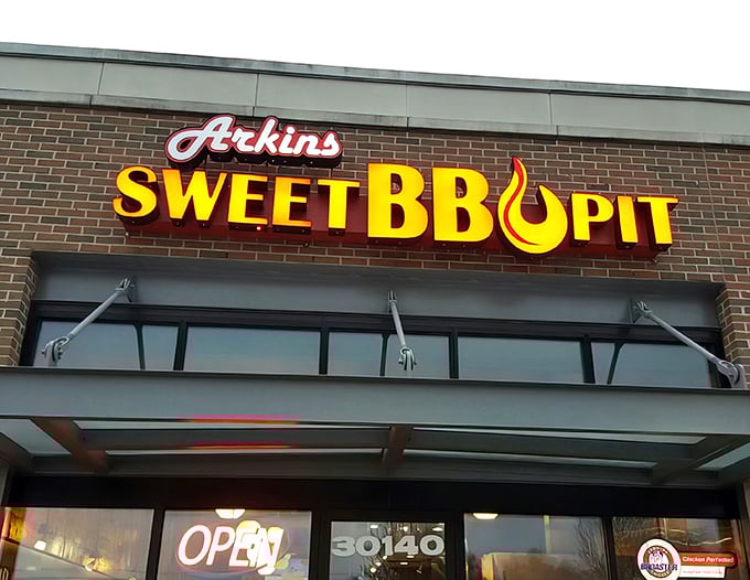 The brick facade might be humble, but that bold red sign is like a beacon calling to serious barbecue pilgrims across Michigan.