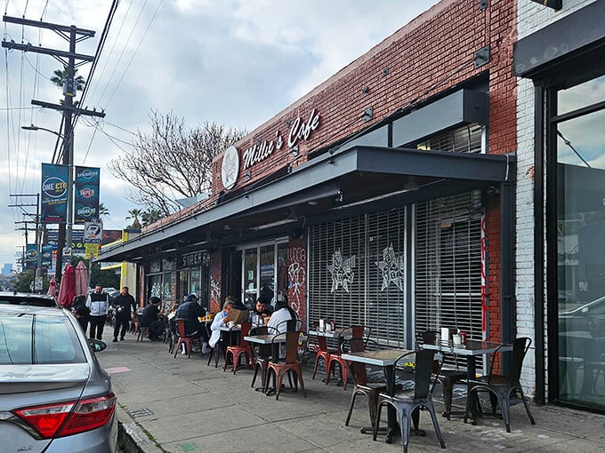 Those red umbrellas aren't just for show—they're sheltering hungry patrons who know that good things come to those who wait.