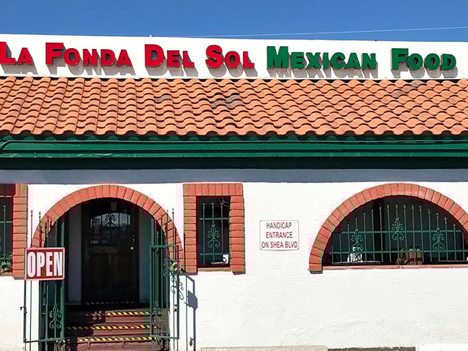 The unassuming exterior of La Fonda Del Sol beckons with its classic Spanish-style roof and distinctive red-trimmed arches—proof that culinary treasures often hide in plain sight.