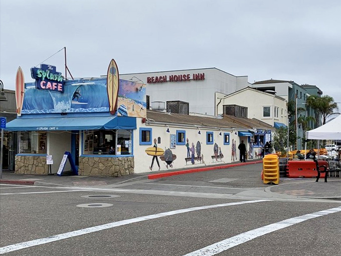 Splash Café's cheerful façade sits perfectly against the Pismo Beach backdrop, where surfboards aren't just decoration—they're a way of life.