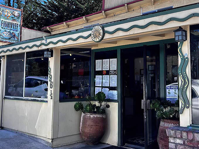 The unassuming exterior of Fishwife belies the culinary treasures within. That American flag isn't just patriotic—it's waving you in for seafood salvation.