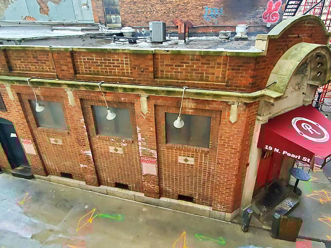 The historic brick exterior of Ringside Café stands as a time capsule in downtown Columbus, its weathered charm promising delicious secrets within.