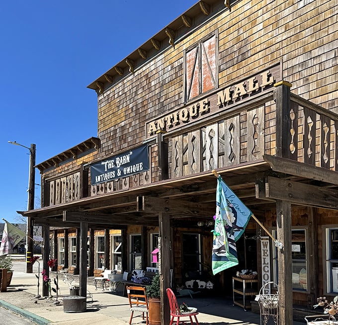 The weathered cedar shingles and rustic signage of The Barn aren't just Instagram-worthy—they're a time portal waiting to be opened.