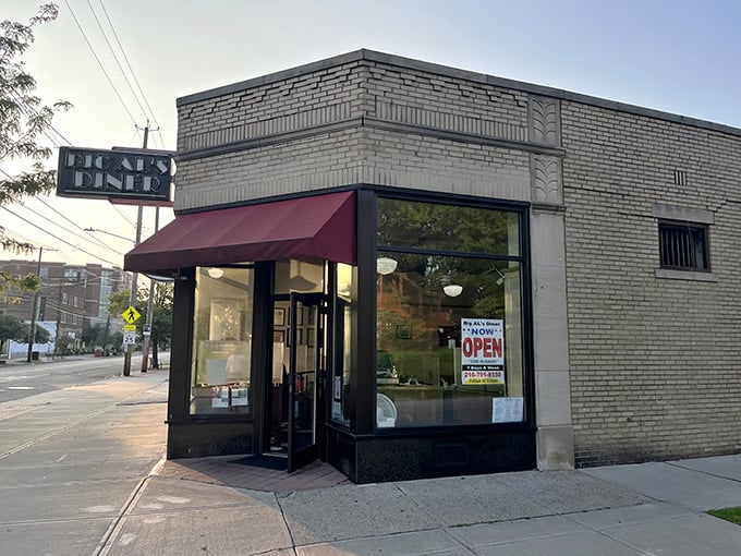 The classic brick exterior with that iconic red awning isn't trying to impress anyone—it's saving all its energy for what matters: the food inside.