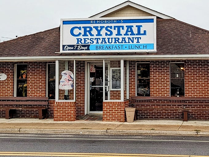 The unassuming brick façade of Crystal Restaurant stands as a beacon of breakfast hope on Rehoboth Avenue, promising honest food without the fanfare.