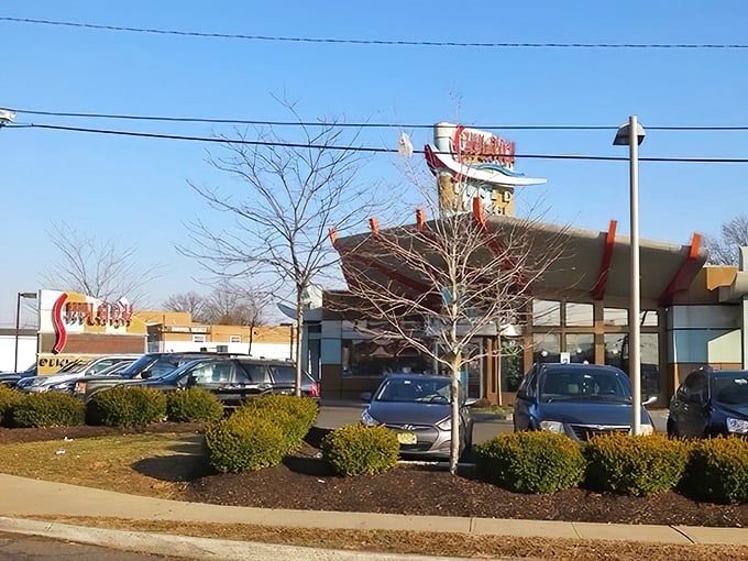 The iconic Skylark sign beckons hungry travelers along Route 1 in Edison – a retro-modern beacon promising diner delights beyond the ordinary.