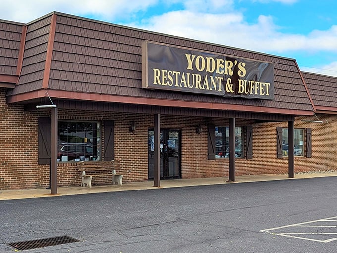 The unassuming brick exterior of Yoder's Restaurant & Buffet hides a culinary treasure trove that locals have been keeping secret from the tourist crowds.