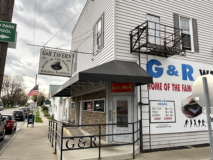 The unassuming white clapboard exterior of G & R Tavern in Waldo, Ohio—proof that culinary treasures often hide in plain sight.