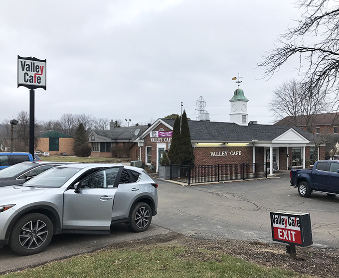 A second view of Valley Café's exterior reveals convenient parking and clear signage – no GPS heroics required for this delicious destination.