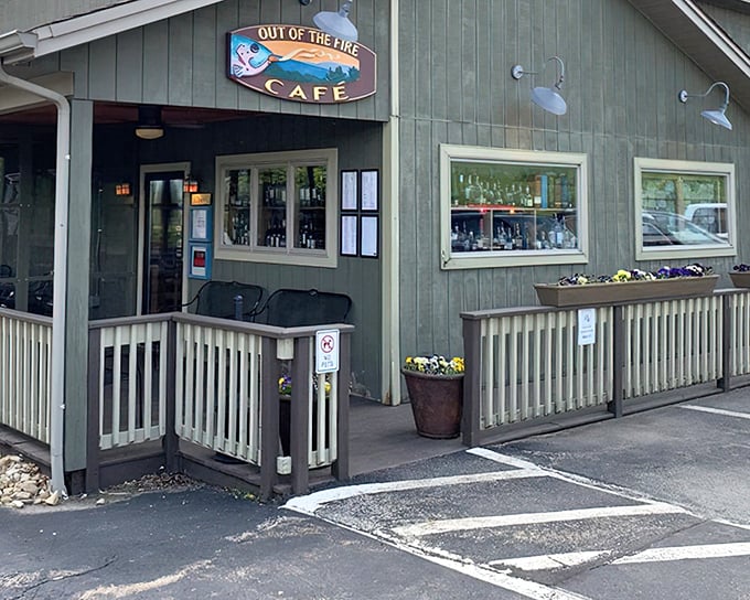 The sage-green exterior of Out of the Fire Café welcomes you like an old friend, promising culinary adventures that live up to its fiery name.