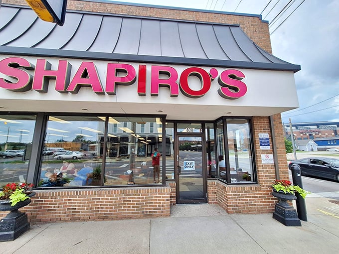 The iconic red Shapiro's sign beckons hungry visitors like a lighthouse for sandwich seekers. This Indianapolis institution has been drawing deli devotees for generations.
