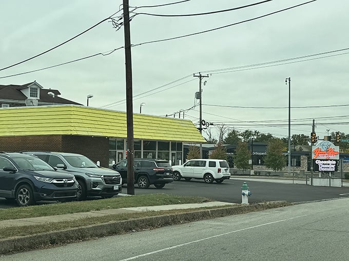 Even on overcast days, that yellow roof brightens the landscape, drawing donut pilgrims from across Montgomery County to its sweet sanctuary.