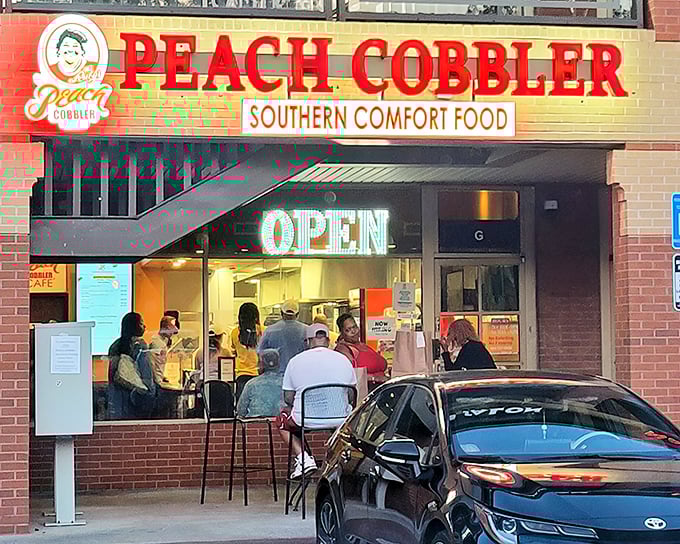 That glowing "OPEN" sign might as well say "PARADISE" – a beacon of comfort food hope in Buckhead's upscale landscape.