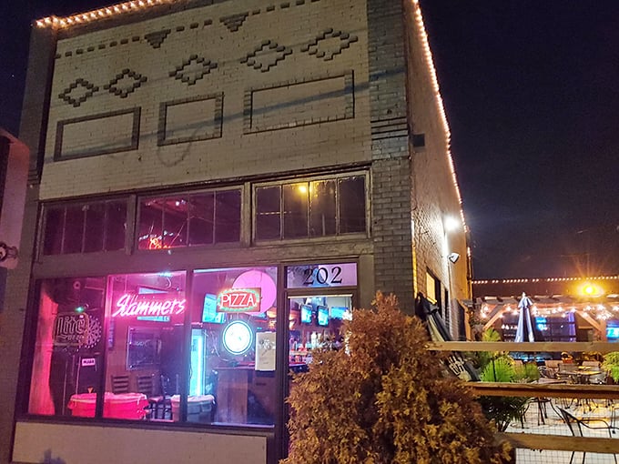 The neon glow of Slammers beckons like a lighthouse for the pizza-starved souls of Columbus. This brick facade hides treasures within.