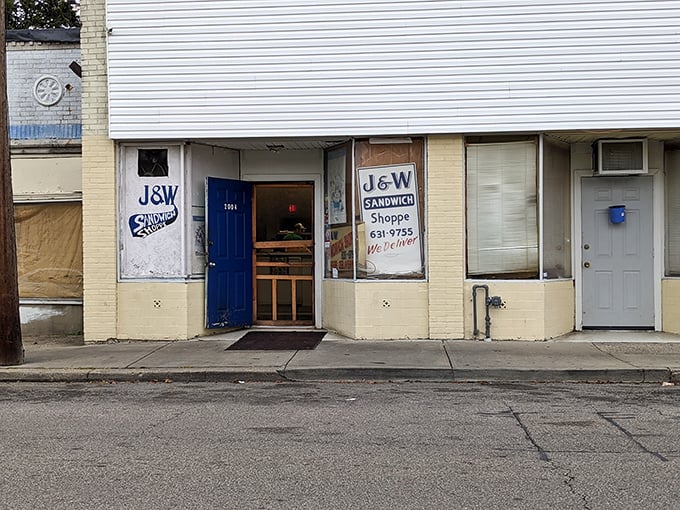The unassuming blue door of J&W Sandwich Shoppe beckons like a secret handshake. No fancy frills, just sandwich perfection waiting inside this Norwood treasure.
