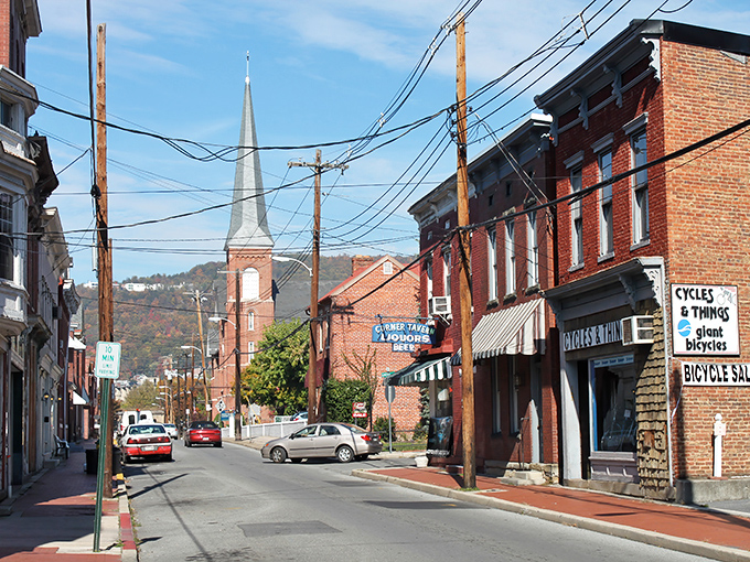The street's brick-paved charm isn't just pretty—it's a time machine where your retirement dollars stretch like saltwater taffy on a summer day.