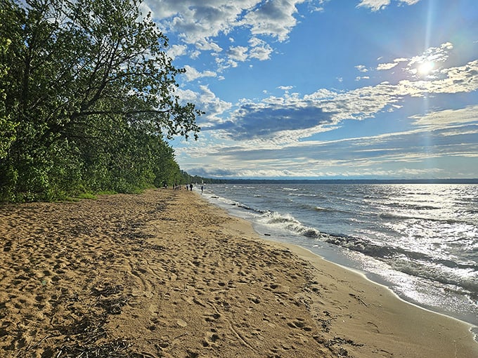 Where heaven meets earth – Brimley's shoreline stretches into infinity, offering a front-row seat to Lake Superior's ever-changing moods.