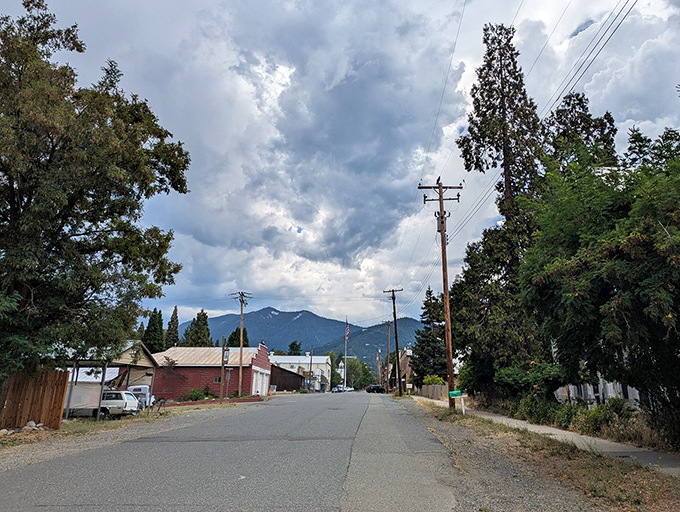 Main Street Etna welcomes you with its historic Avery Theatre marquee and mountain backdrop – small-town charm that's big on character.