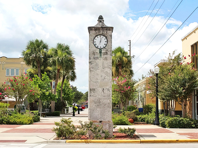 The iconic clock tower stands sentinel over downtown Lake Wales, where time seems to move at a more civilized pace than the coastal chaos.