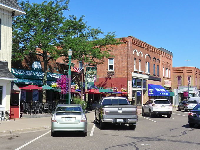 Hayward's Main Street isn't just picturesque—it's the kind of place where hanging flower baskets compete with historic brick buildings for your attention.