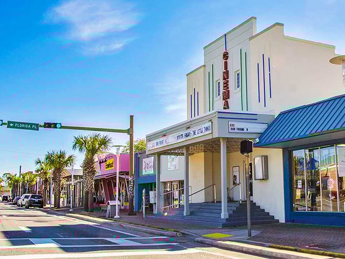 Neon storefronts and a retro cinema marquee line the streets of Fort Walton Beach, proving charm doesn’t have to come with a big-city price tag.