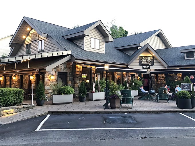 Mountain charm meets culinary excellence at Stonewalls' inviting exterior, where the stone facade promises warmth before you even step inside.