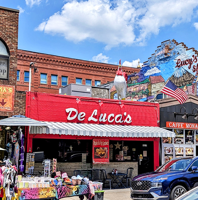 The bright red storefront of DeLuca's stands out like a beacon of breakfast hope on Penn Avenue, promising culinary salvation to hungry Strip District wanderers.