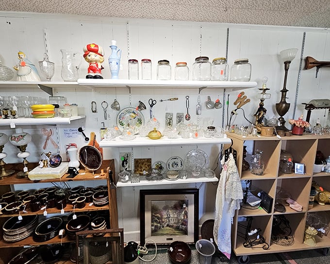 Kitchen nostalgia on display! Those vintage canisters and glassware aren't just decorative—they're time machines to grandmother's Sunday dinners.