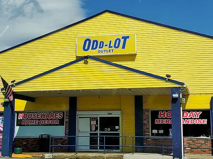 The sunshine-yellow exterior of Odd-Lot Outlet stands like a beacon of bargain hope in Tannersville, promising treasures that would make even the most frugal shopper giddy.