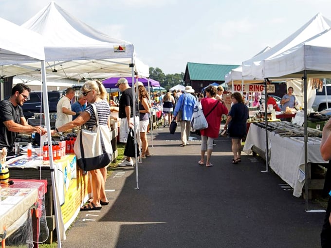 The heartbeat of Bucks County commerce happens under these white tents, where treasure hunters and bargain seekers converge every Tuesday and Saturday.