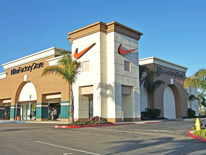 The iconic Nike Factory Store stands as a beacon of hope for sneakerheads on a budget, where California sunshine meets discount swooshes.