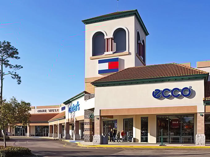 The iconic tower of St. Augustine Premium Outlets stands like a beacon for bargain hunters, promising treasures within those Mediterranean-inspired walls.