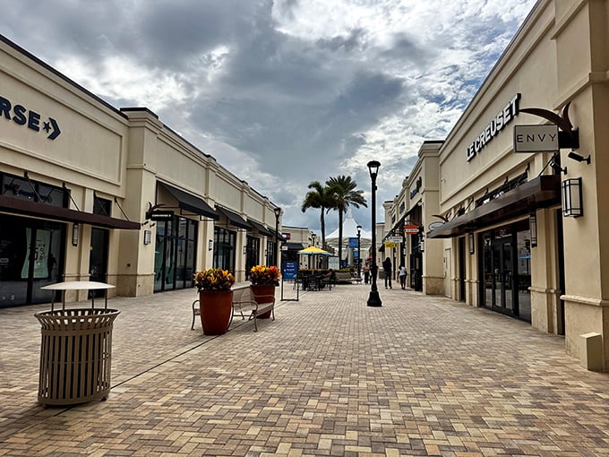 Cloudy skies can't dampen the shopping spirit at these elegant promenades, where retail therapy awaits between tropical palm trees.