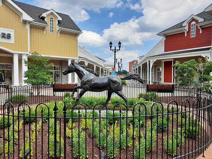 The iconic horse statue gallops eternally between colorful barn-inspired buildings, serving as both landmark and meeting point for exhausted shoppers who've lost their companions.