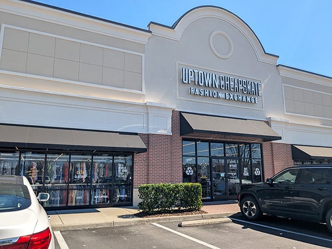 The iconic storefront beckons like a fashion oasis in the desert of retail prices. Uptown Cheapskate's curved architecture promises treasures within.
