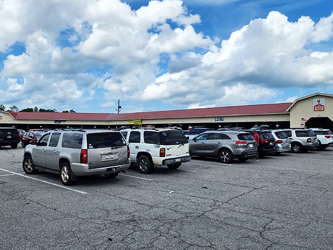 The sprawling exterior of Barnyard Flea Market beckons treasure hunters with its no-frills charm and packed parking lot—weekend adventures await inside!