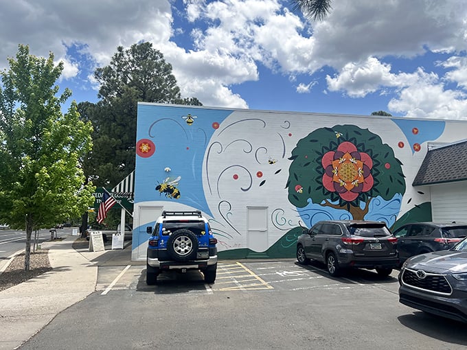 The vibrant mural outside Cedar Closet Thrift Shop isn't just eye candy—it's a colorful promise of the treasures waiting inside this Flagstaff bargain paradise.