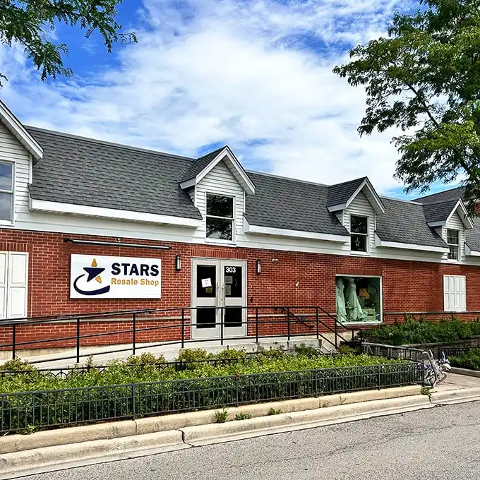 The brick-and-mortar treasure chest of Wheaton beckons with its star-studded sign, promising adventures in thrifting that your wallet will thank you for.
