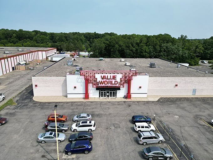 The iconic red-framed entrance of Value World stands like a portal to treasure hunting adventures, beckoning bargain seekers from across Michigan.