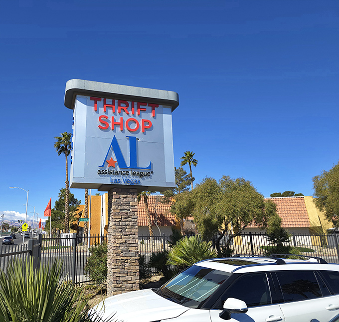 The iconic blue sign stands tall against the Nevada sky, like a beacon calling all treasure hunters to their happy place.